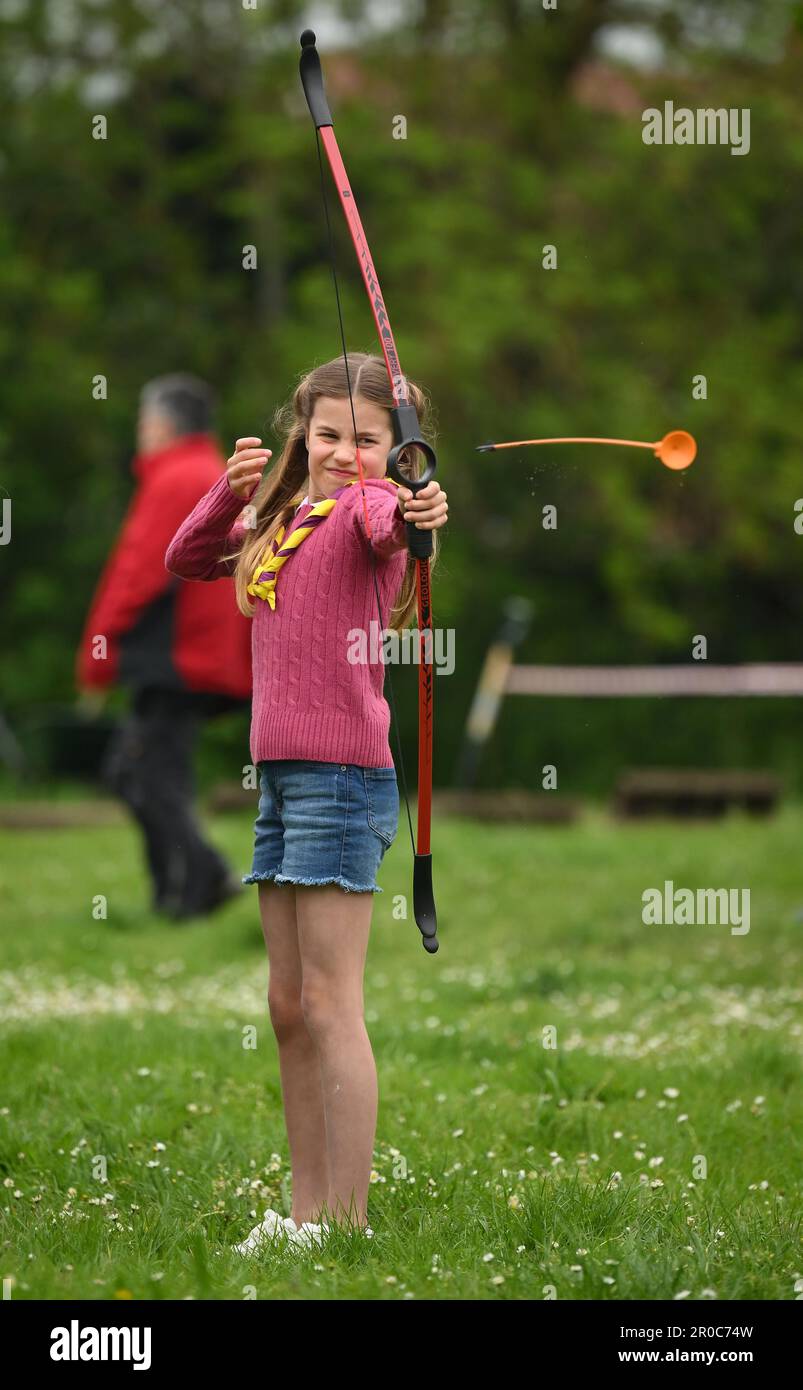 Princess Charlotte tries archery while joining volunteers to help ...