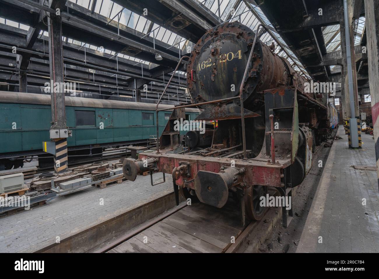 Old warehouse with abandoned trains somewhere in Belgium, Urbex Stock ...