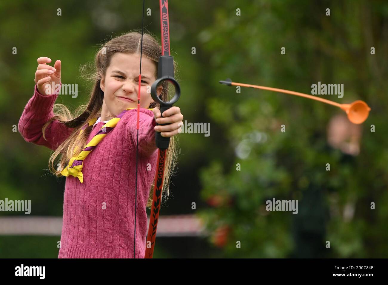 Princess Charlotte tries archery while joining volunteers to help ...