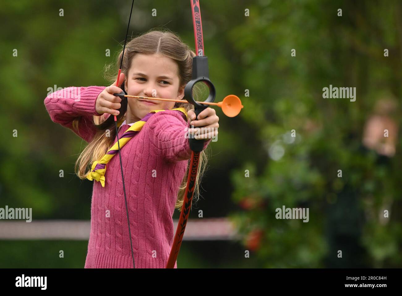 Princess Charlotte tries archery while joining volunteers to help ...