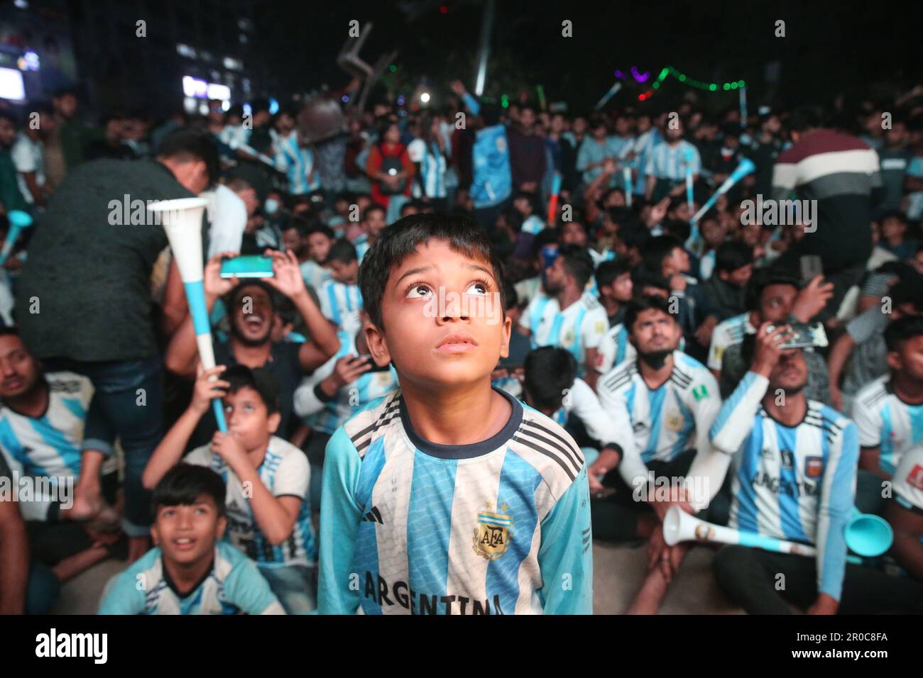 Crazy Argentina football fans of Bangladesh watching Argentina and Poland match at Dhaka ...