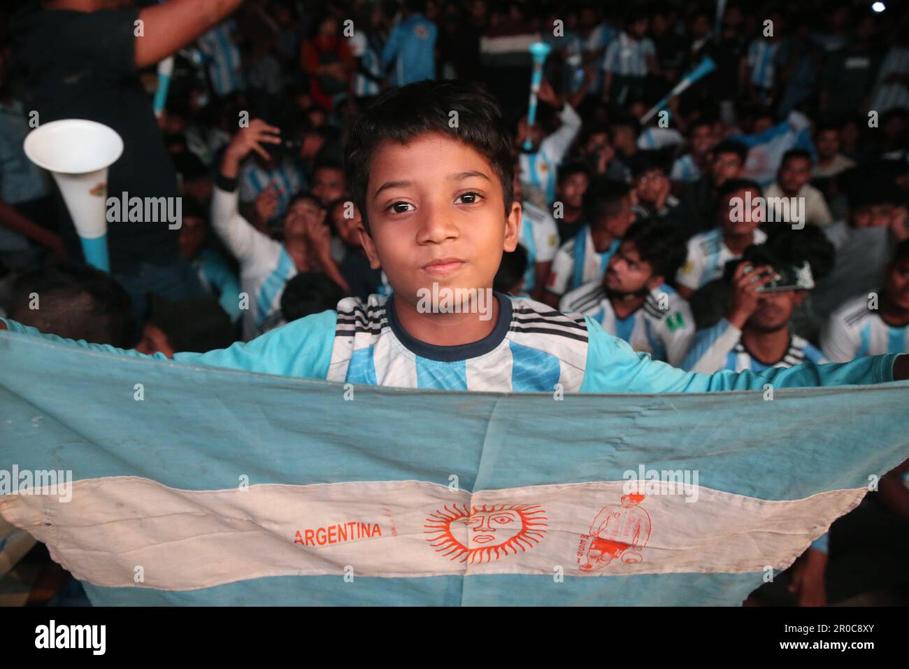Crazy Argentina football fans of Bangladesh watching Argentina and Poland match at Dhaka ...