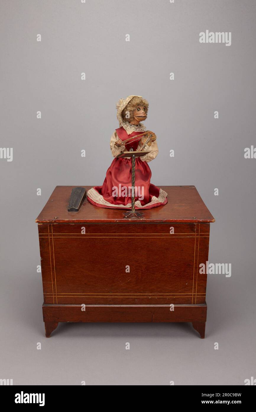 Monkey Automaton Playing Violin on Barrel Organ Stock Photo - Alamy