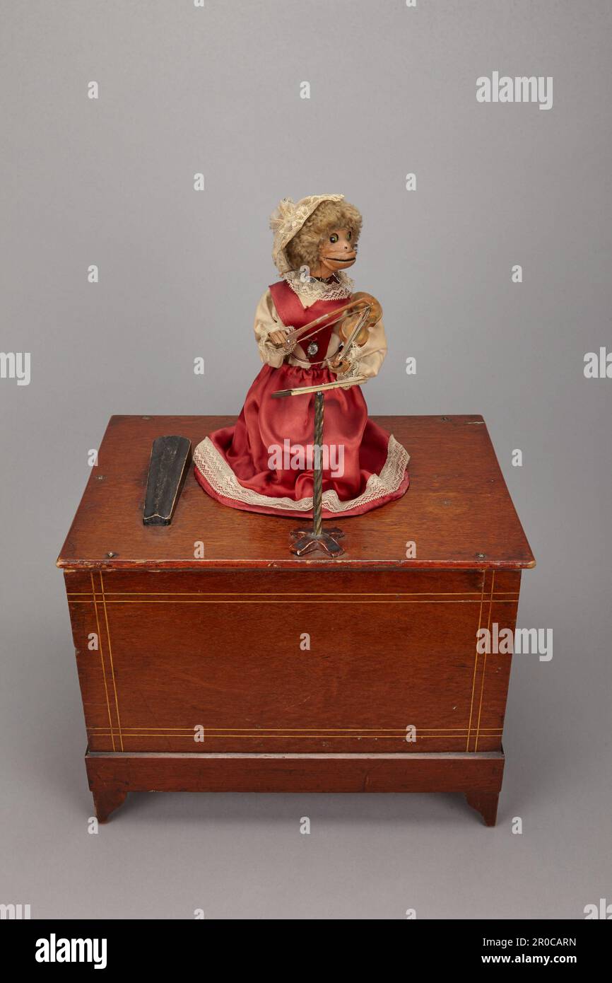 Monkey Automaton Playing Violin on Barrel Organ Stock Photo - Alamy