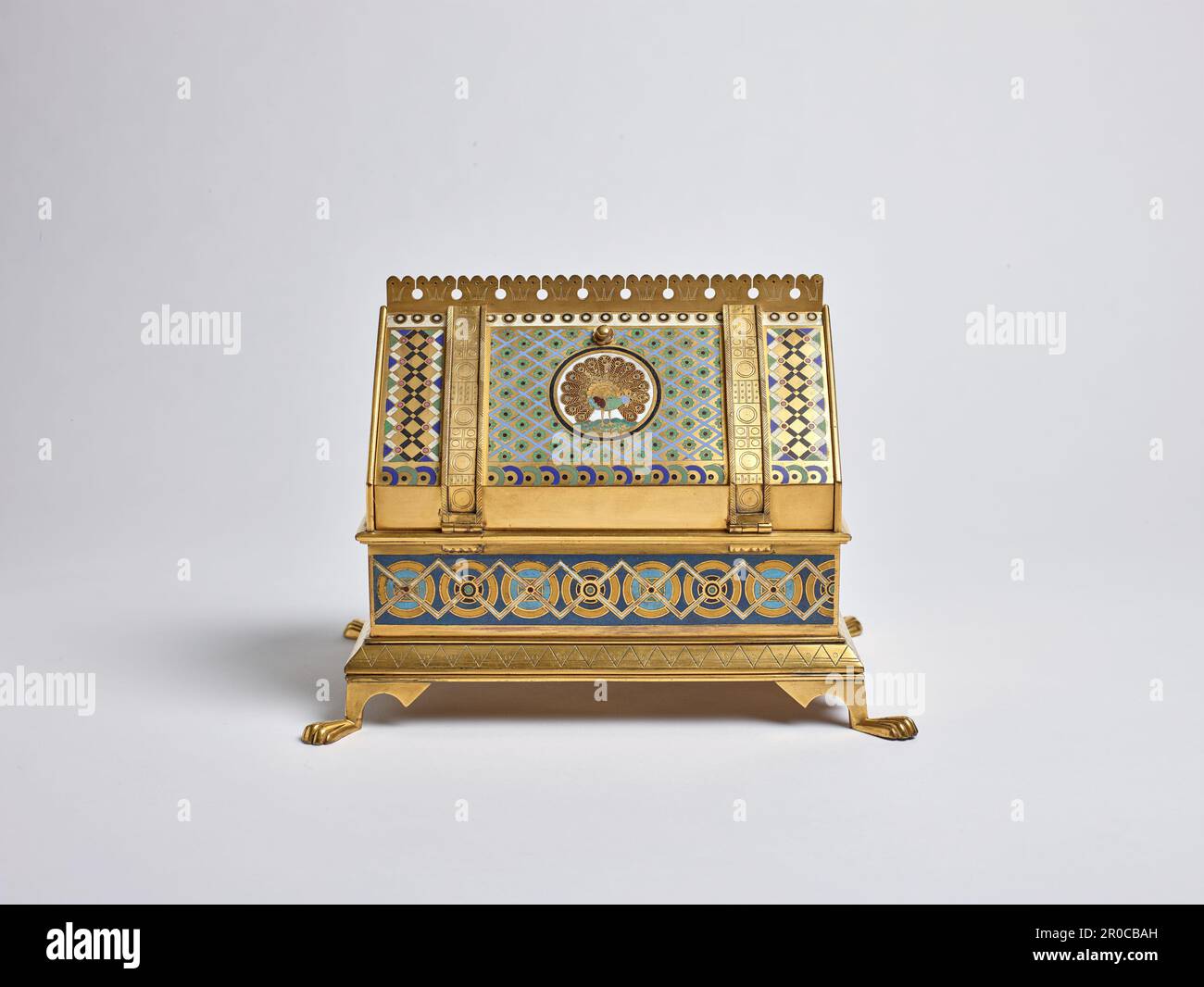 Jewel Casket, 1850-1885. Gilt, brass and enamel, in the form of an ...
