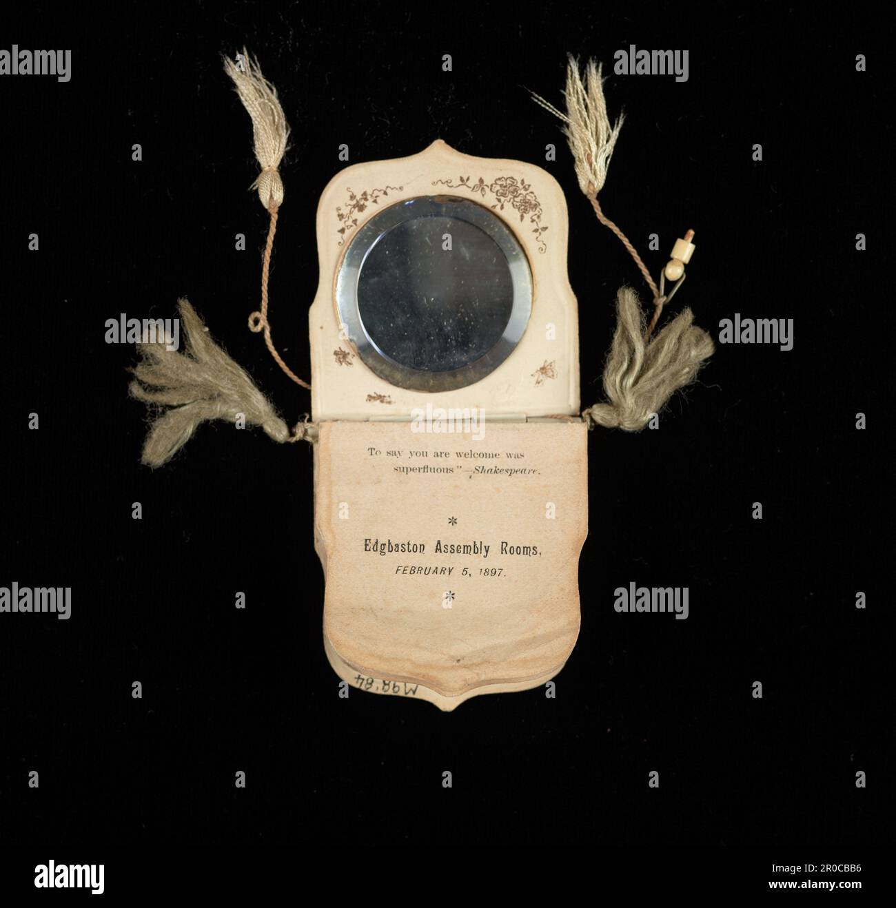 Dance Card, 1897. Dance card in a cover in the shape of a crest ...