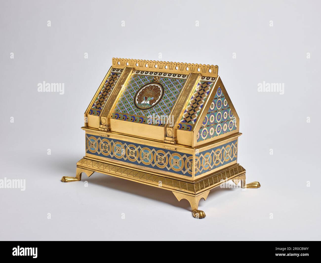 Jewel Casket, 1850-1885. Gilt, brass and enamel, in the form of an ...
