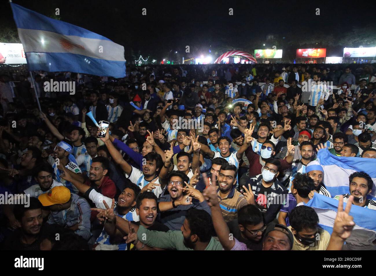 Crazy Argentina football fans of Bangladesh watching Argentina and Poland match at Dhaka ...