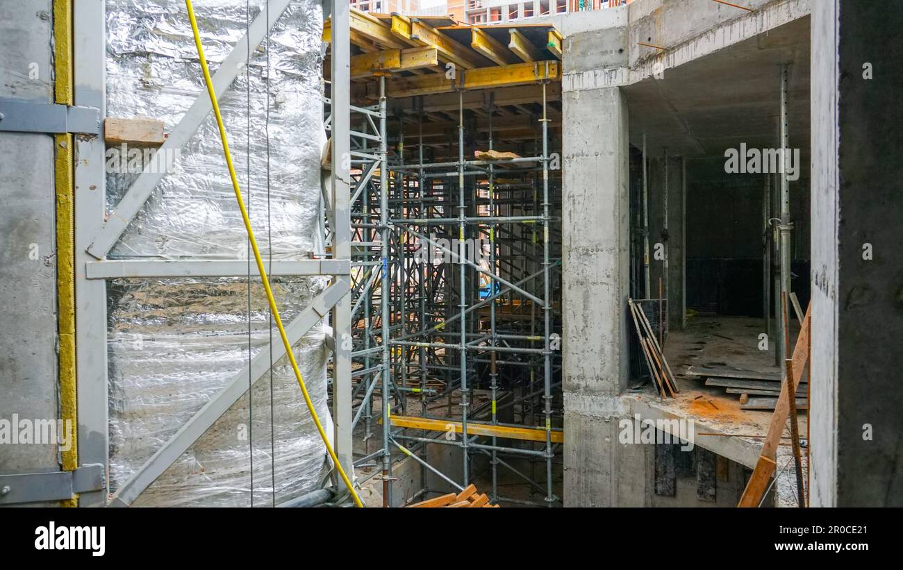 Metal supports on the construction of a house. Installation of floors ...