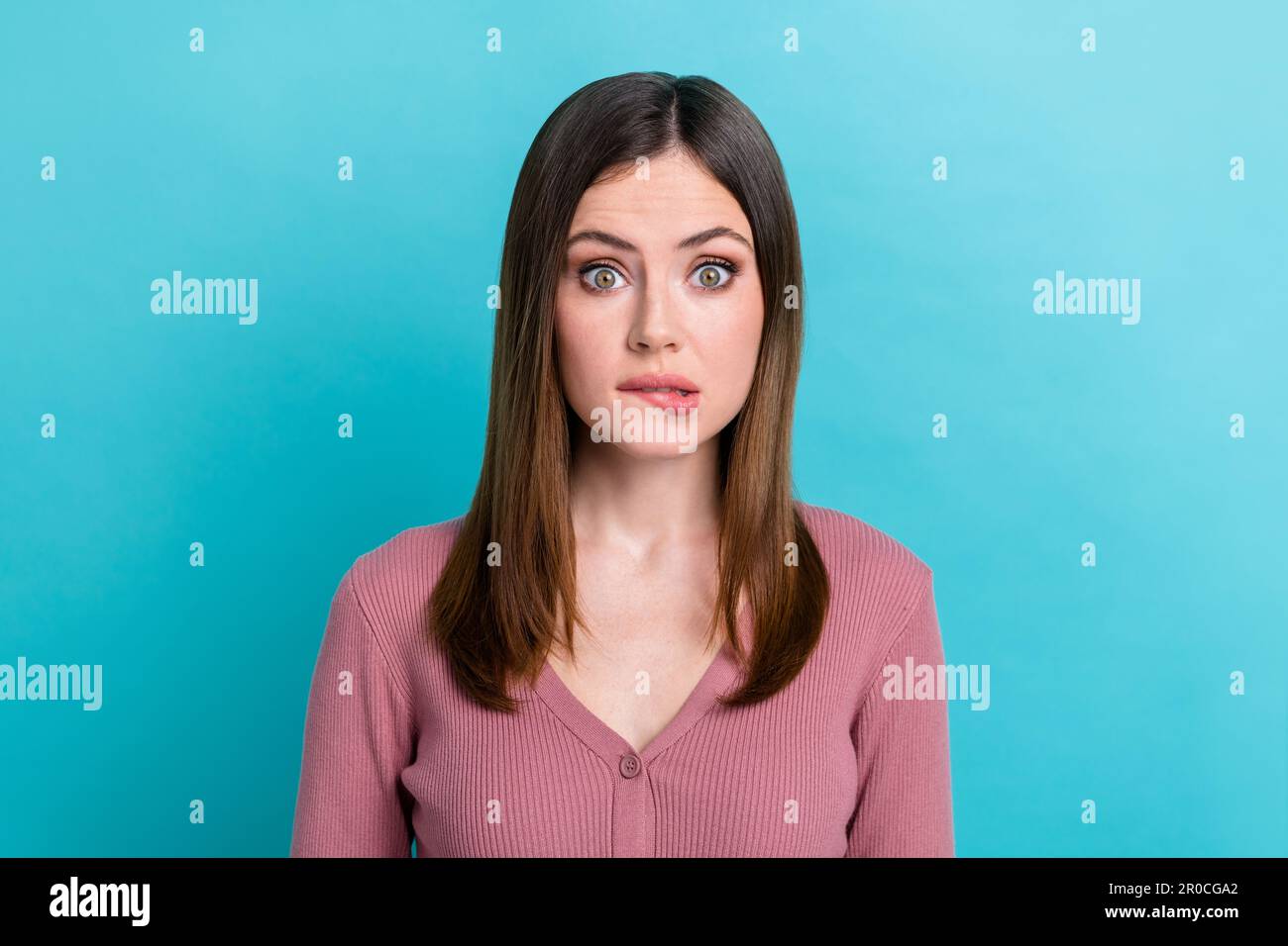 Photo of astonished impressed girl with straight hairdo dressed pink ...