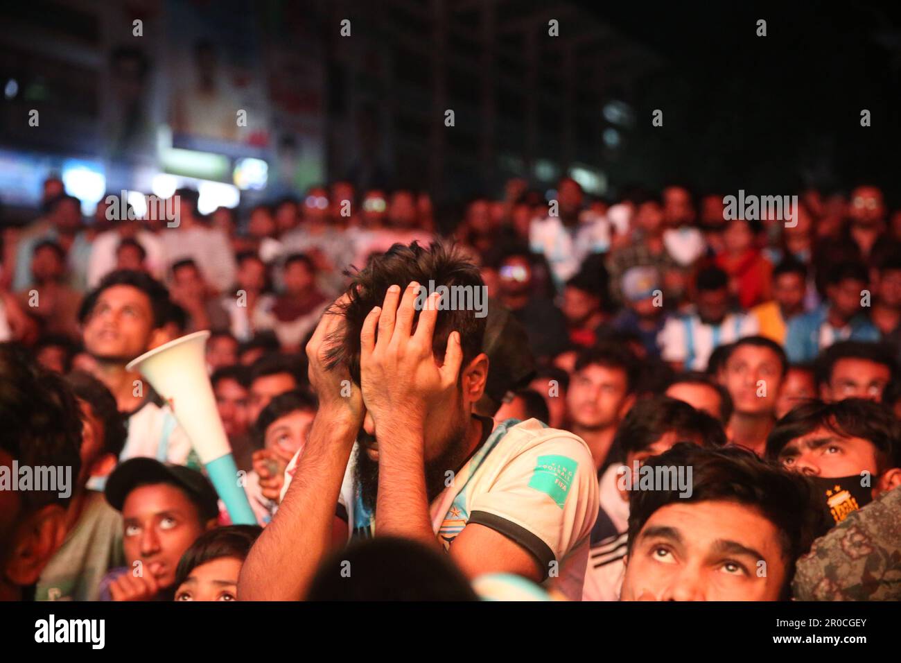 Crazy Argentina football fans of Bangladesh watching Argentina and Poland match at Dhaka ...