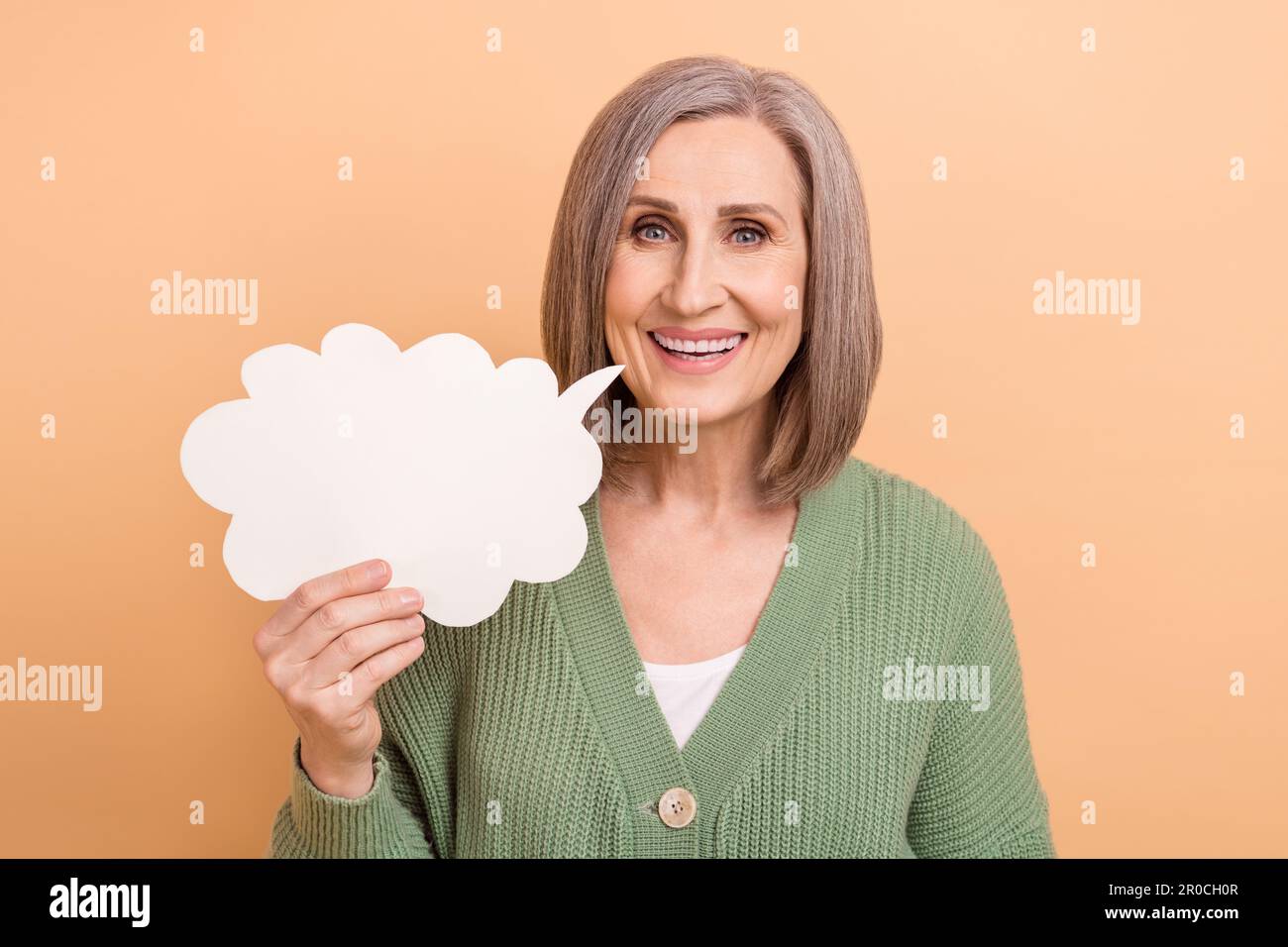 Portrait photo of senior beautiful woman hold bubble cloud speech empty ...