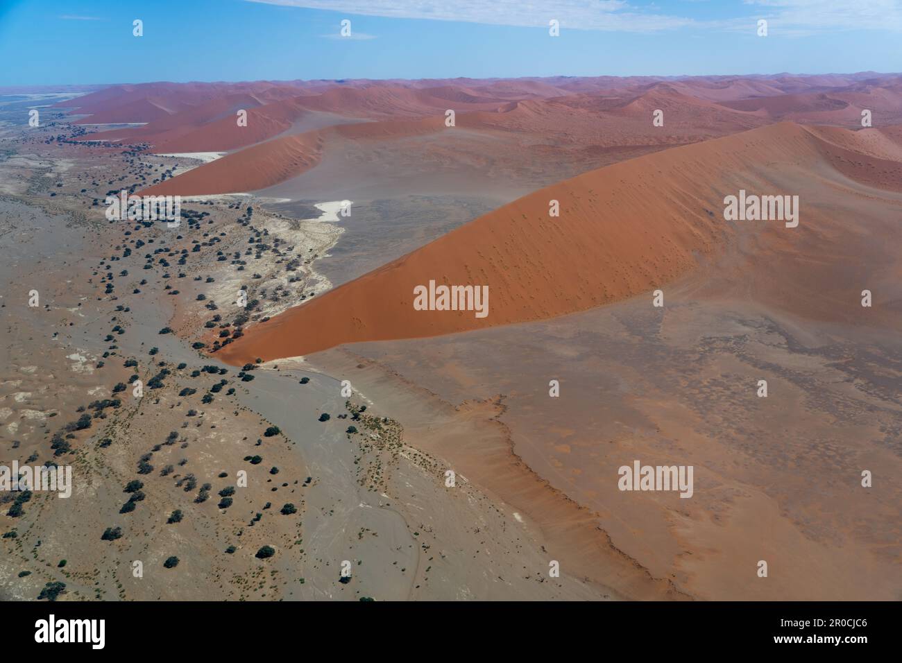 Aerial photography of the red sand dunes, Sossusvlei, Namib-Naukluft National Park, Namibia. The ...