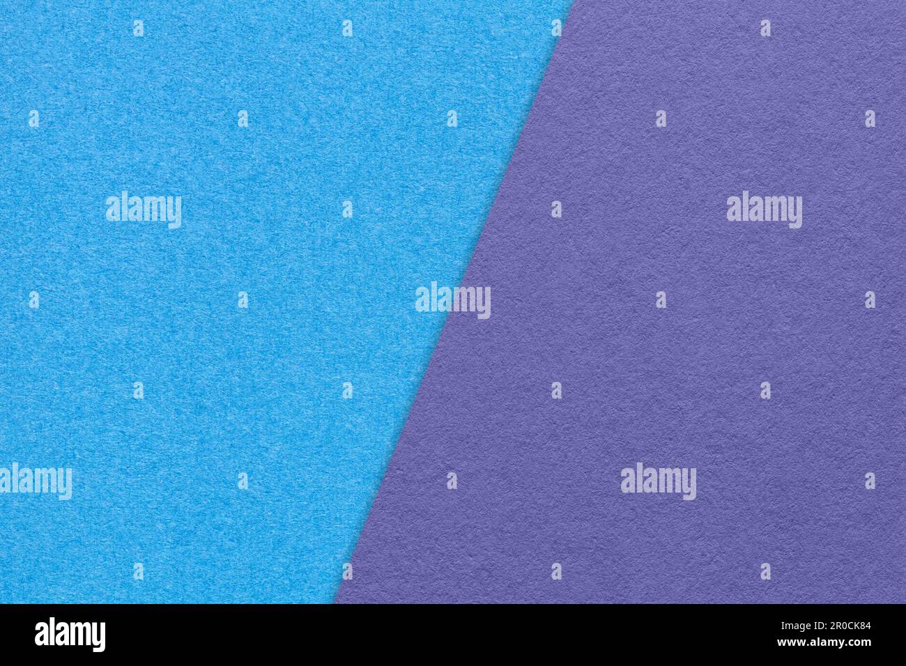 Texture of craft light blue and violet paper background, half two ...