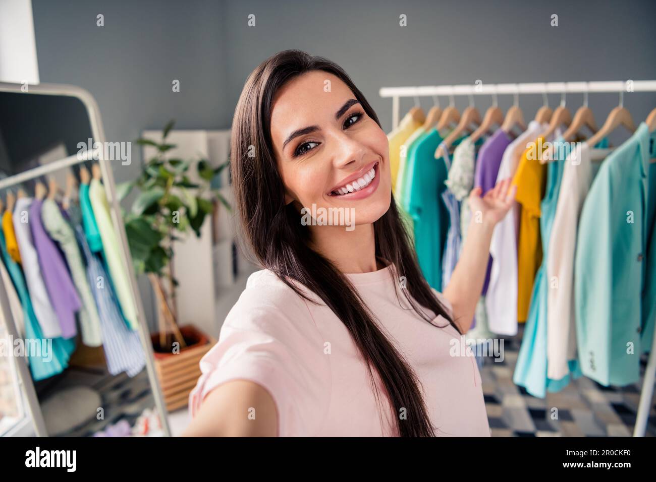 Portrait of happy charming lady filming selfie on social media ...