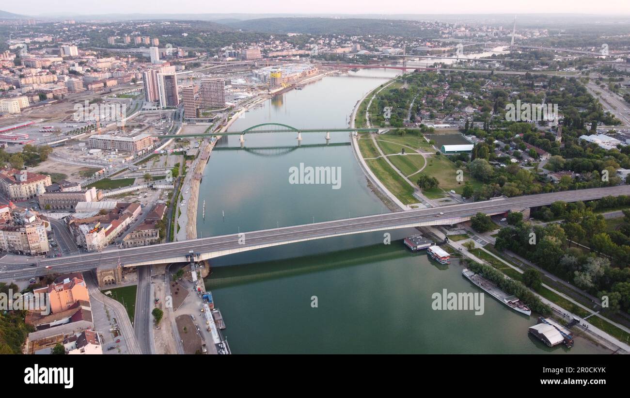 An aerial view of a cityscape with the Branko bridge over a river ...
