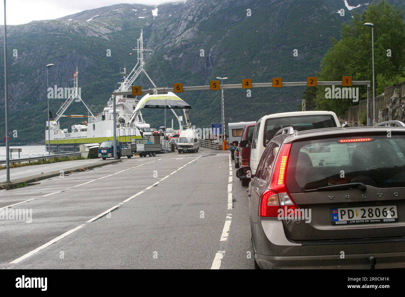 Cars loading onto a ferry Stock Photo - Alamy