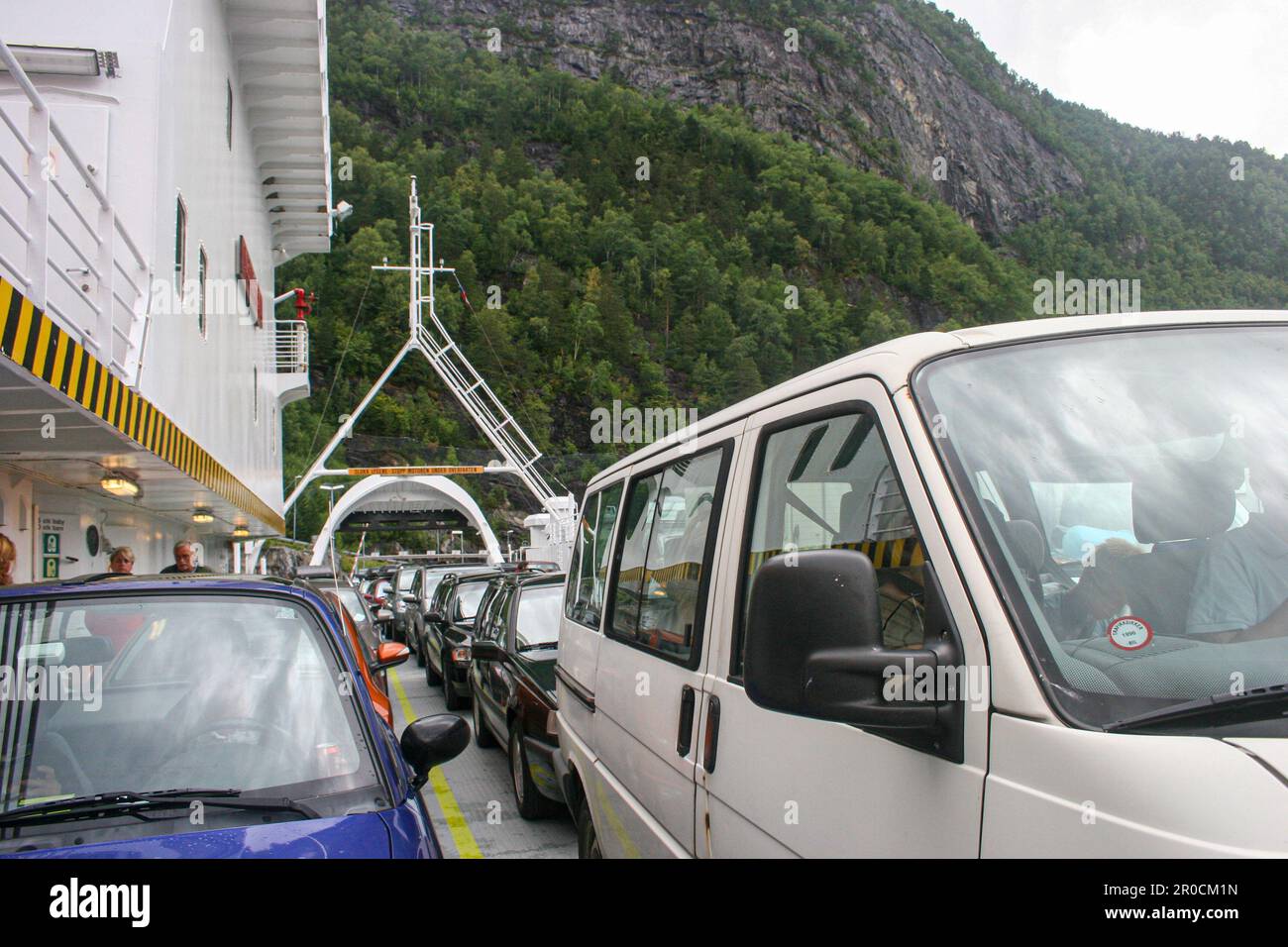 Cars loading onto a ferry Stock Photo - Alamy