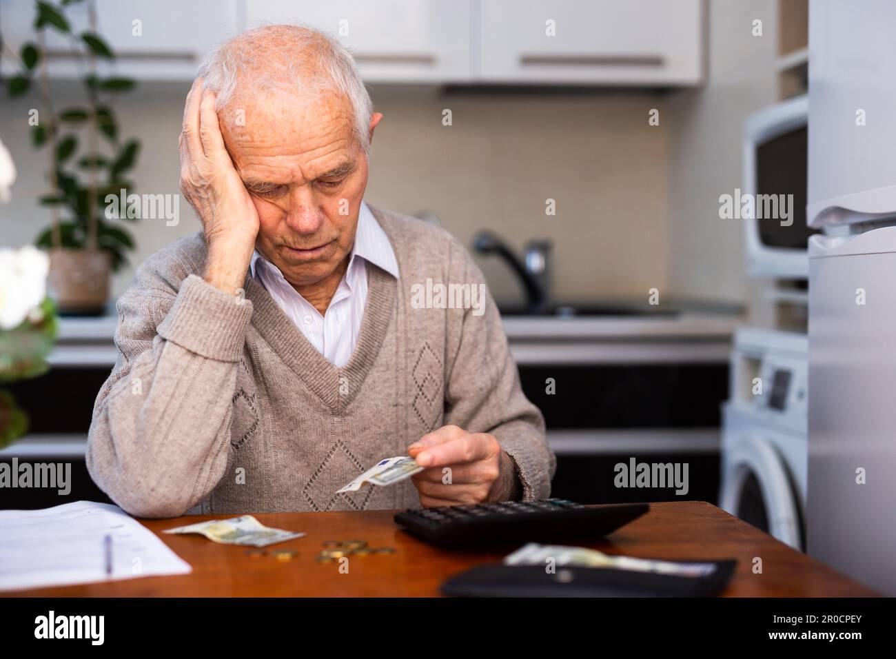 Desperate pensioner alone in home hi-res stock photography and images ...