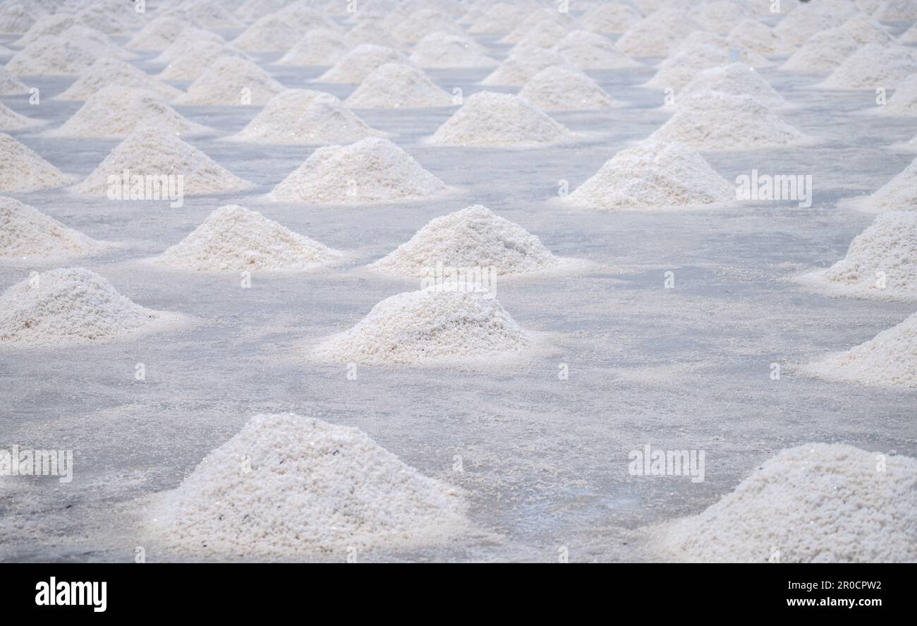 Sea salt farm. Pile of brine salt. Raw material of salt industrial ...