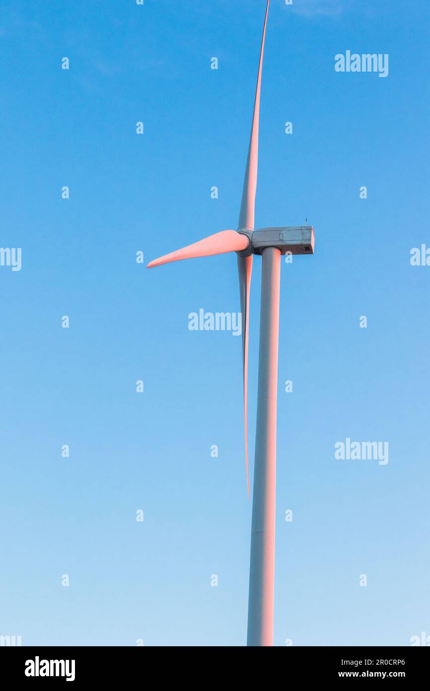 A wind turbine is a machine that can receive and convert the kinetic ...