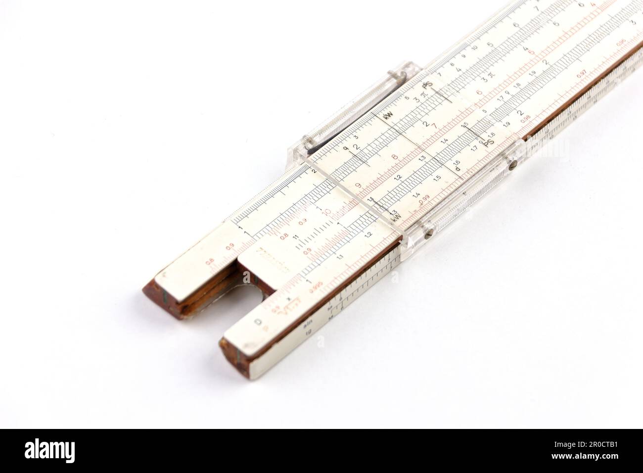 Vintage slide rule calculating and measuring instrument. Mechanical analog computing instrument ...