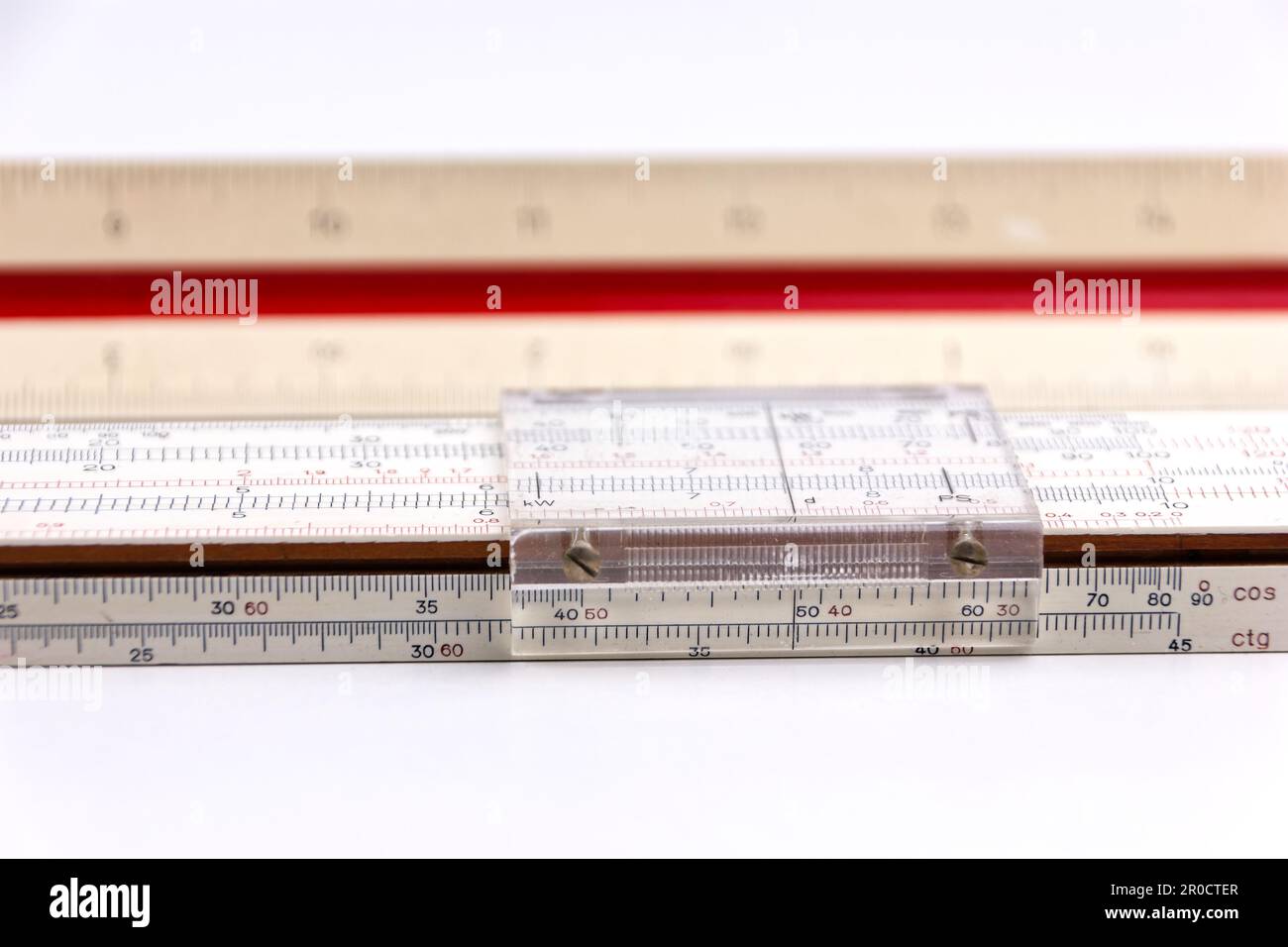 Vintage slide rule calculating and measuring instrument. Mechanical analog computing instrument ...