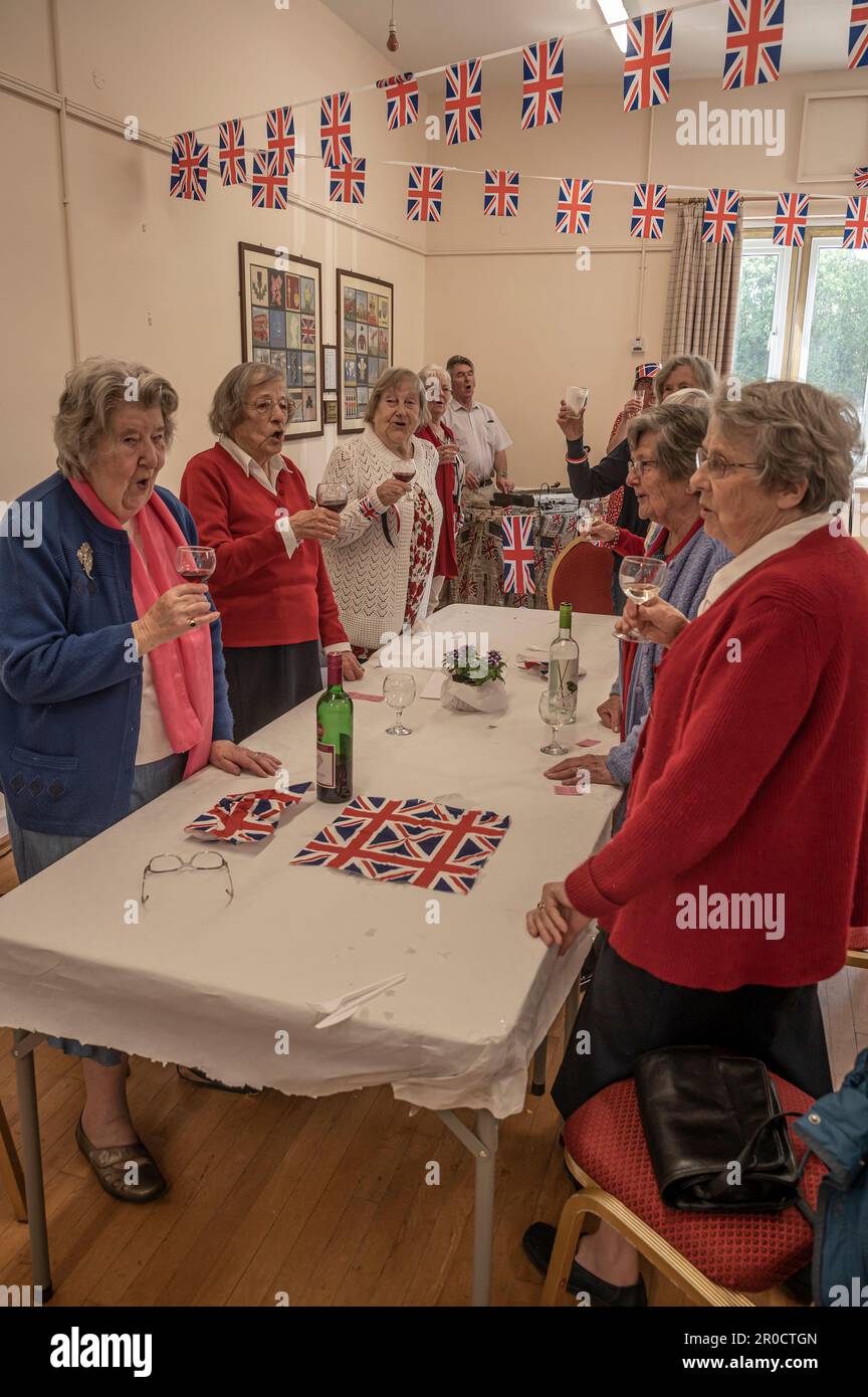 king's coronation party in village hall Stock Photo - Alamy
