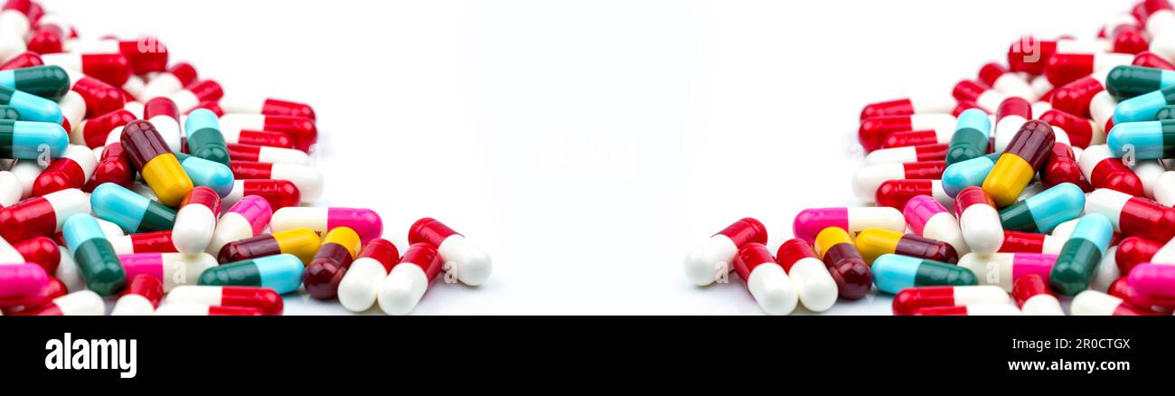 Frame of colorful antibiotic capsule pills. Pile of antibiotic capsule ...