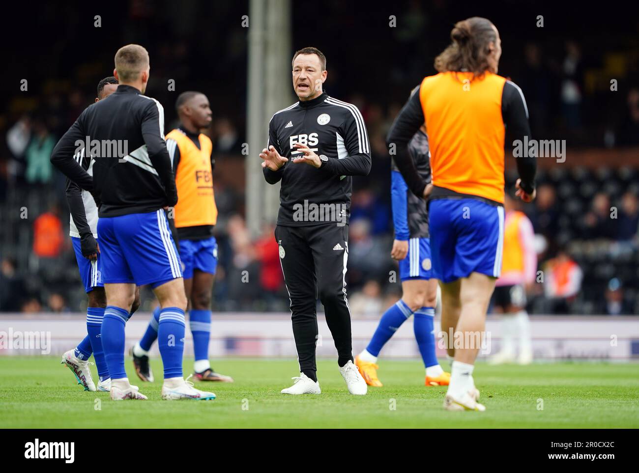 Leicester City coach John Terry with players during warm up ahead of ...