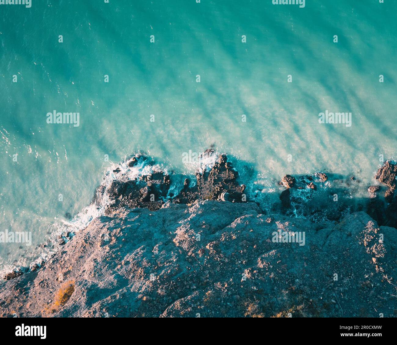 An aerial view of sea waves breaking beach Stock Photo - Alamy