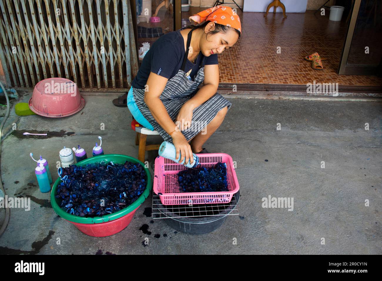 Craftsmanship of thai women or professional artist working batik ikat ...