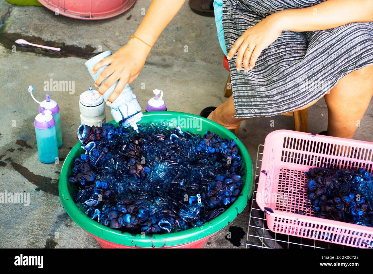 Thai craftsmanship technician or professional artist working batik ikat ...