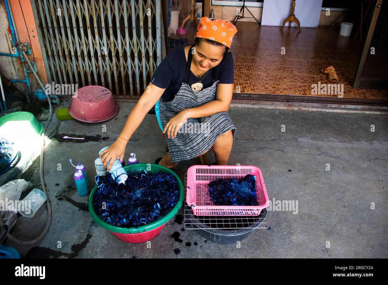 Craftsmanship of thai women or professional artist working batik ikat ...