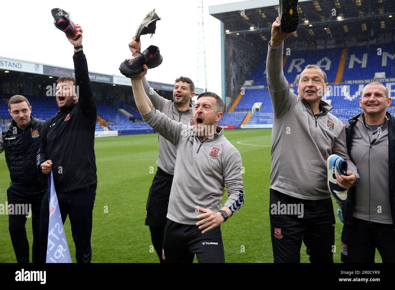 Northampton Town manager Jon Brady, assistant Colin Calderwood and the ... Northampton Town manager Jon Brady, assistant Colin Calderwood and the ...