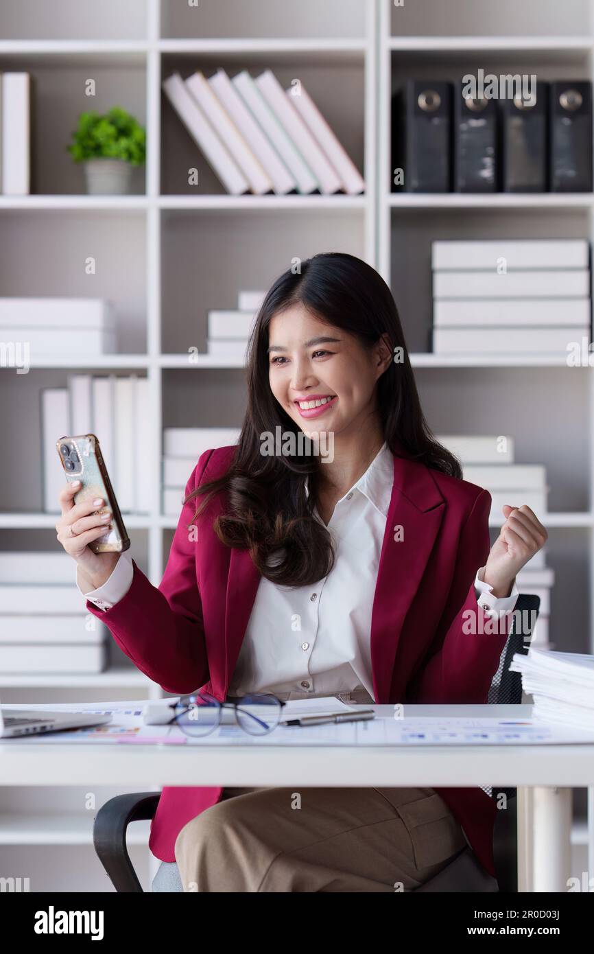 Happy executive sales business woman cheering excited in celebration ...