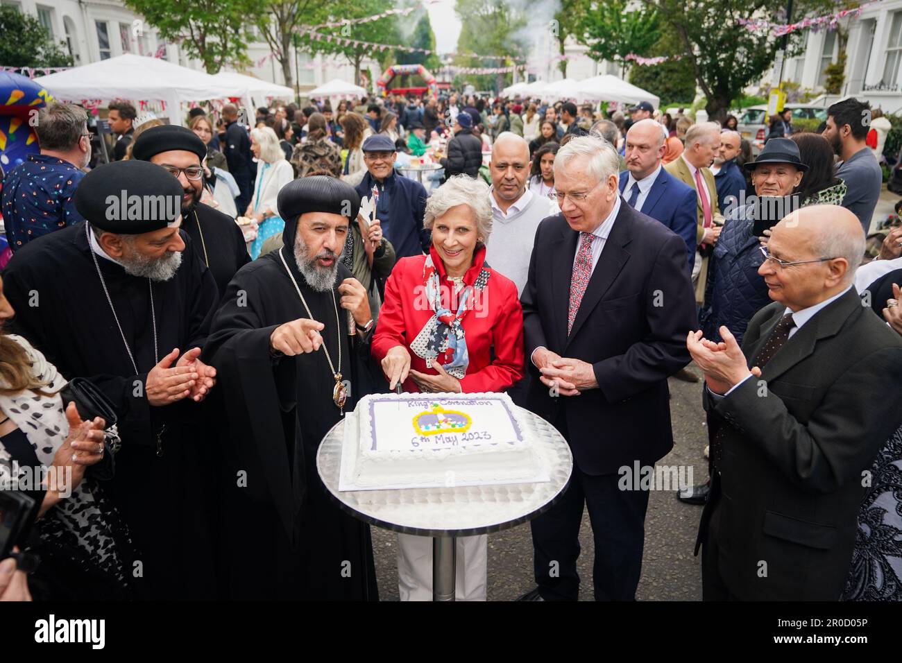 The Duke and Duchess of Gloucester cut a cake at the Big Help Out event ...