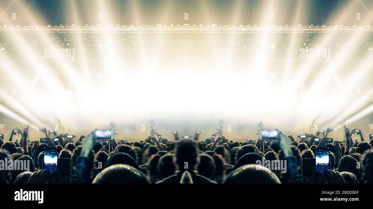 Music concert stage in a venue with crowd of people Stock Photo - Alamy