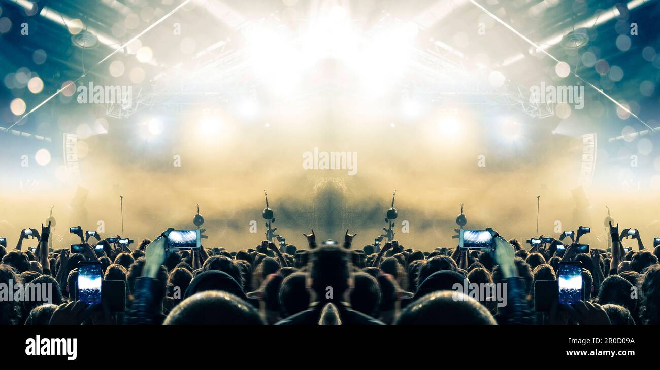 Music concert stage in a venue with crowd of people Stock Photo - Alamy