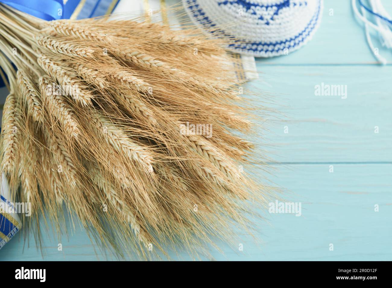 Shavuot jewish holiday celebration. Bouquet of golden ripe wheat with ...