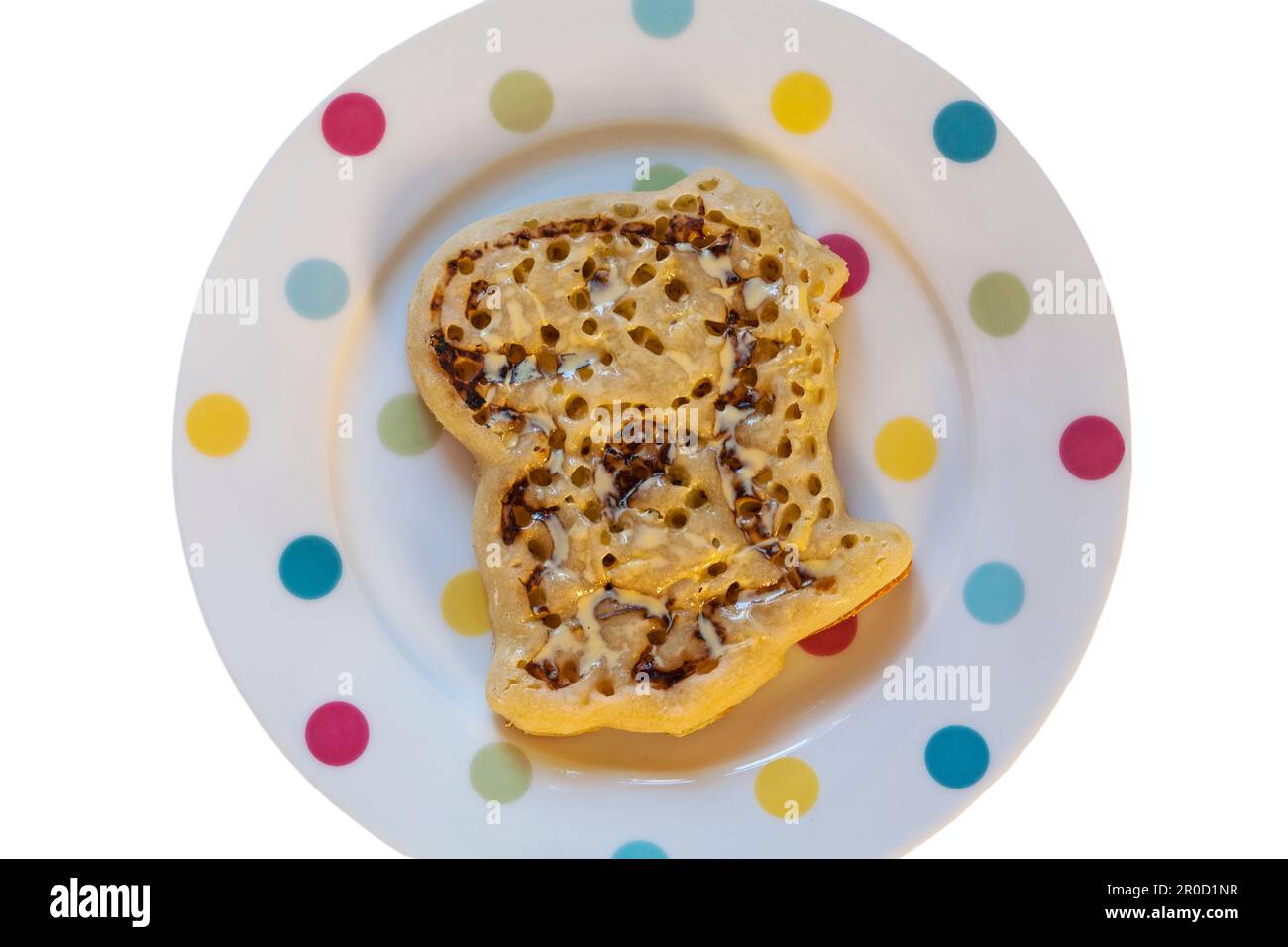 M&S super awesome Crumpe-Saurus Crumpet on plate with spots on light ...