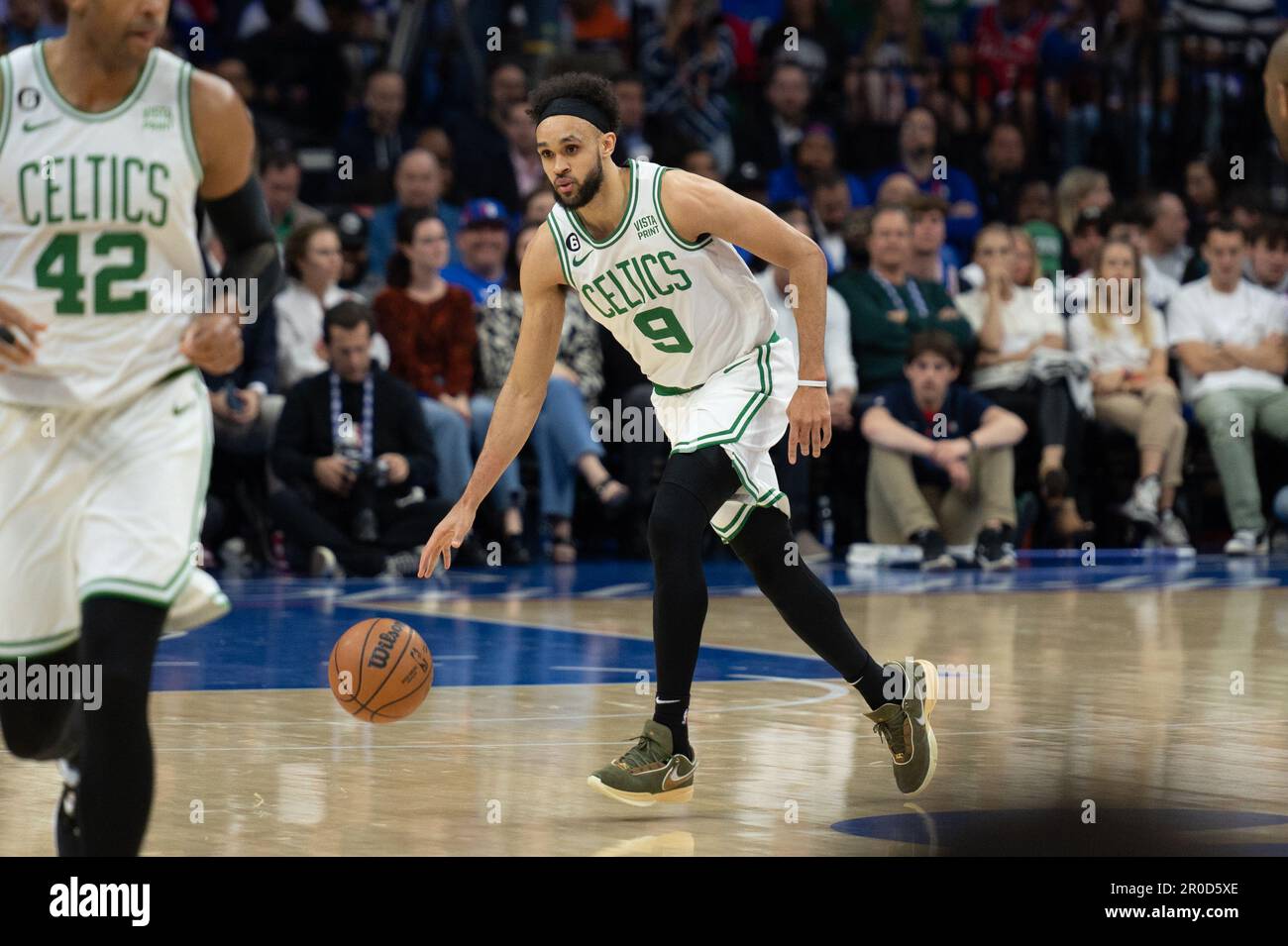PHILADELPHIA, PA - MAY 7: Derrick White #9 of the Boston Celtics drives ...