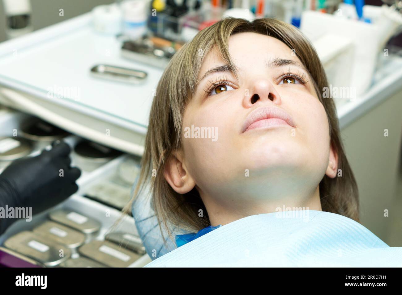 Woman in chair at dentist. Female patient with sad face. Concept of ...