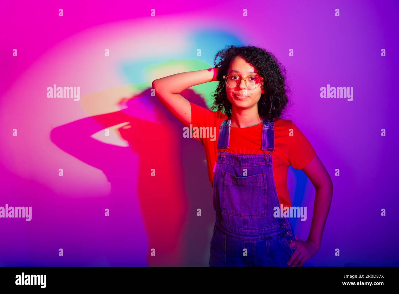 Portrait of pretty young woman wearing eyeglasses, isolated on ...