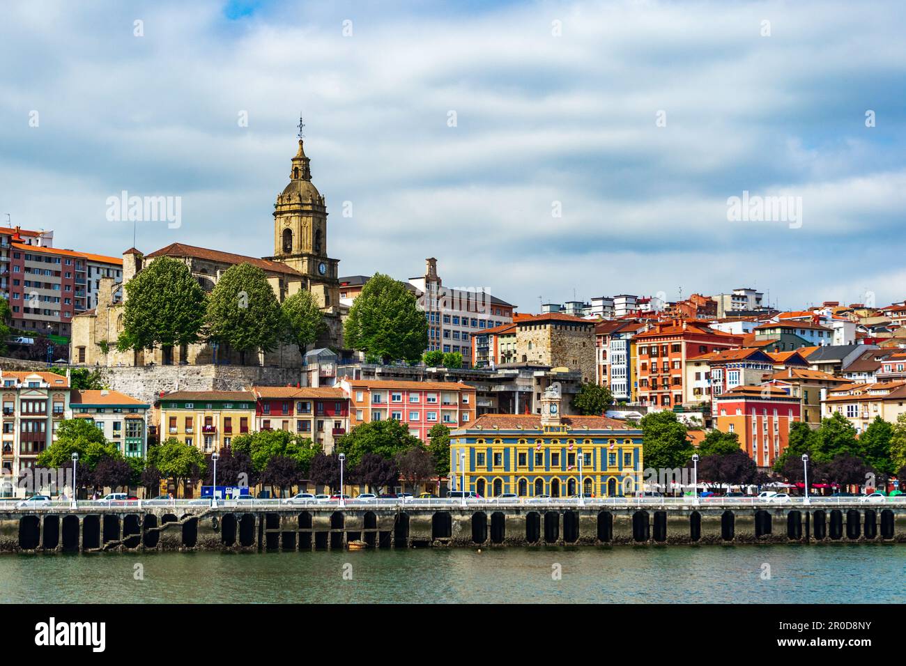 View of Portugalete town by Nervion river, and Sandra Maria basilica ...