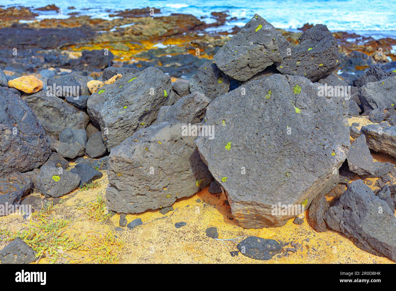 Large rocks on the beach . Volcanic coast of Lanzarote Stock Photo - Alamy
