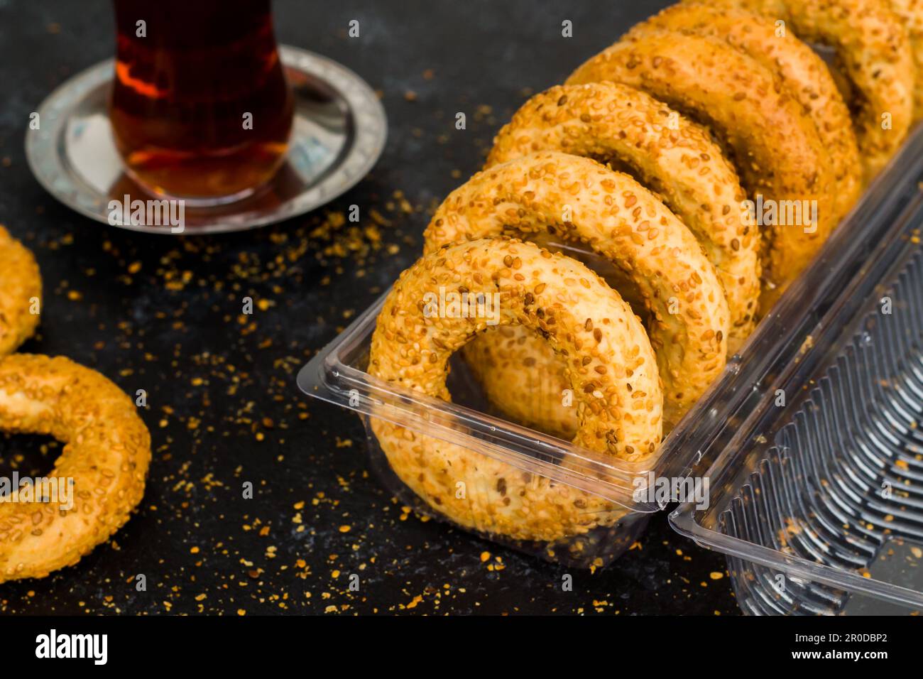 Traditional Turkish Kandil Sesame Rings in transparent box at dark ...