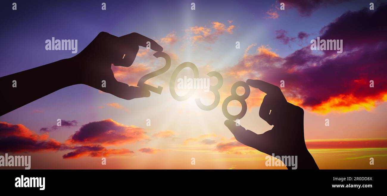 2038 - human hands holding black silhouette year number Stock Photo - Alamy