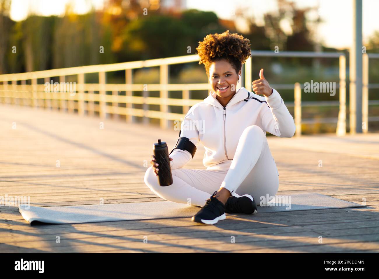 Morning Outdoor Workout Of Happy African American Female Athlete Stock ...