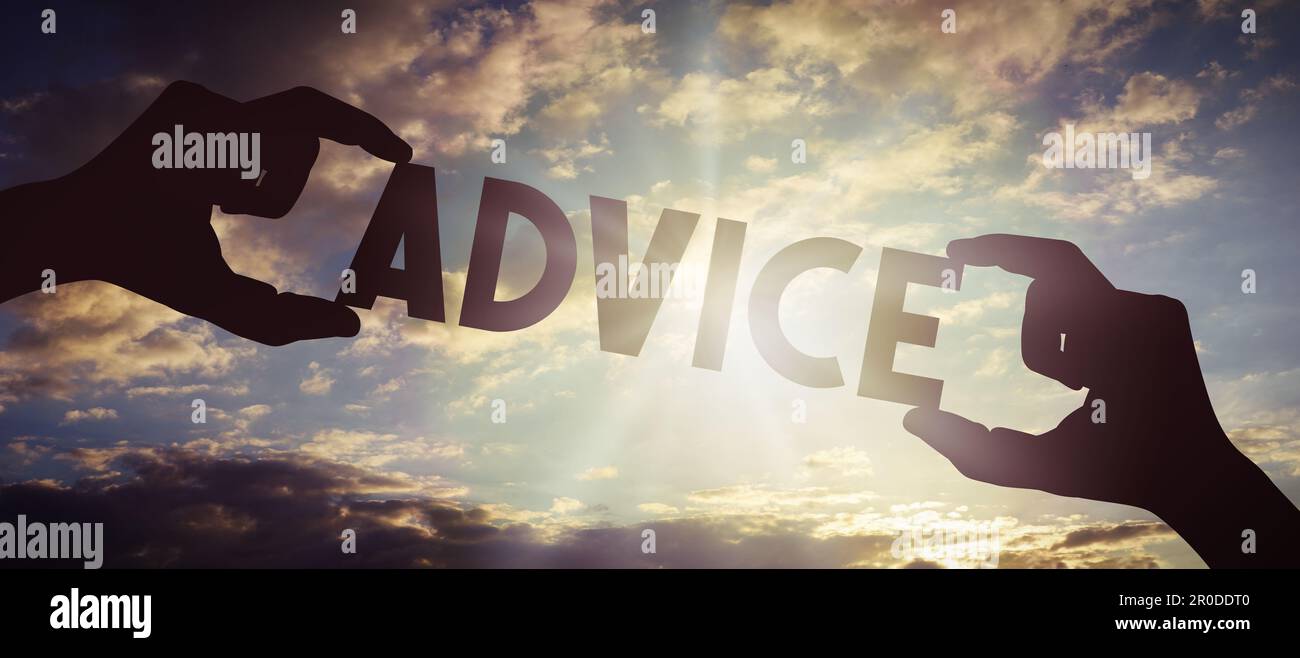 Advice - human hands holding black silhouette word Stock Photo - Alamy